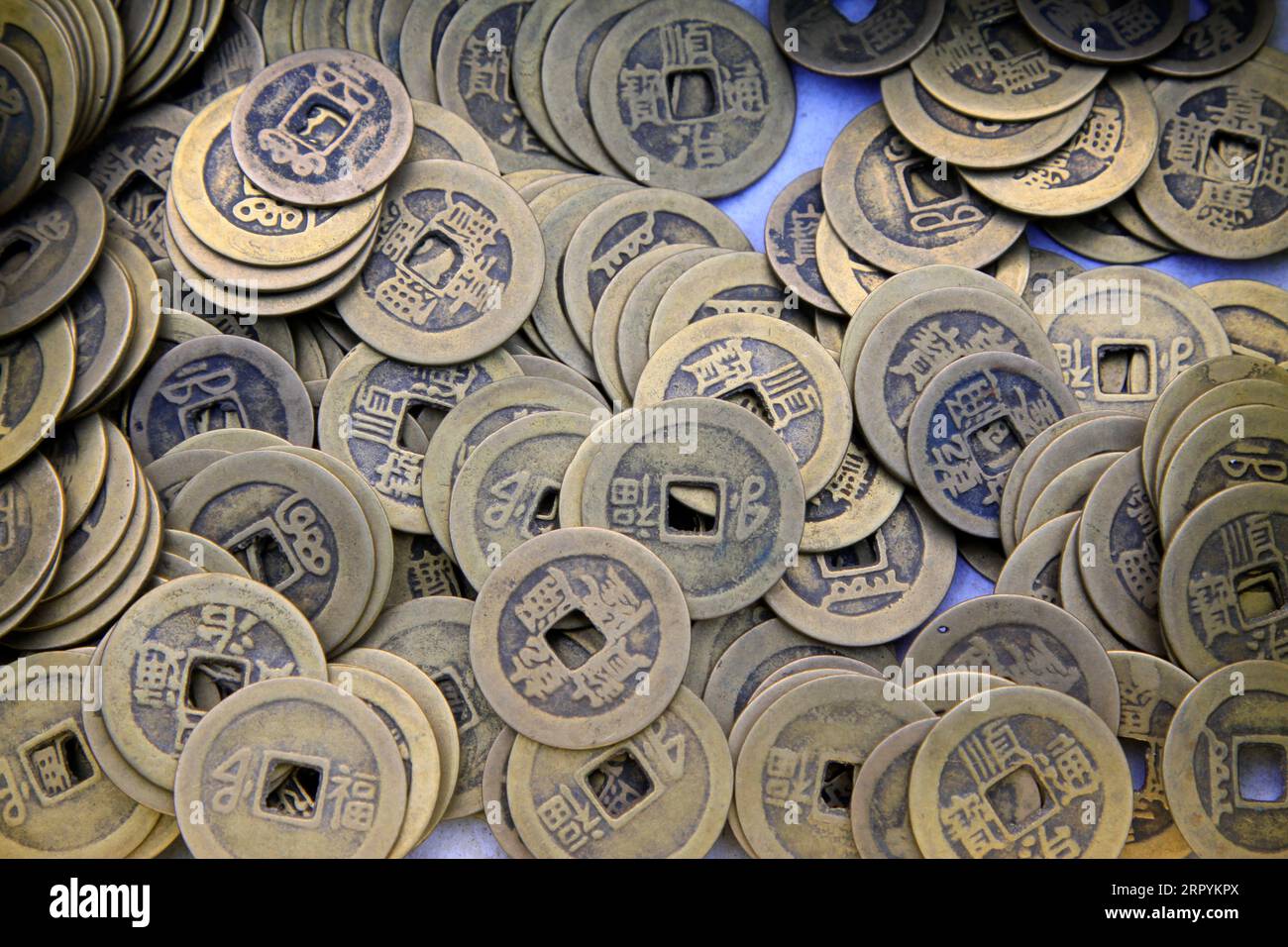 Chinese ancient metal currency, closeup of photo Stock Photo - Alamy