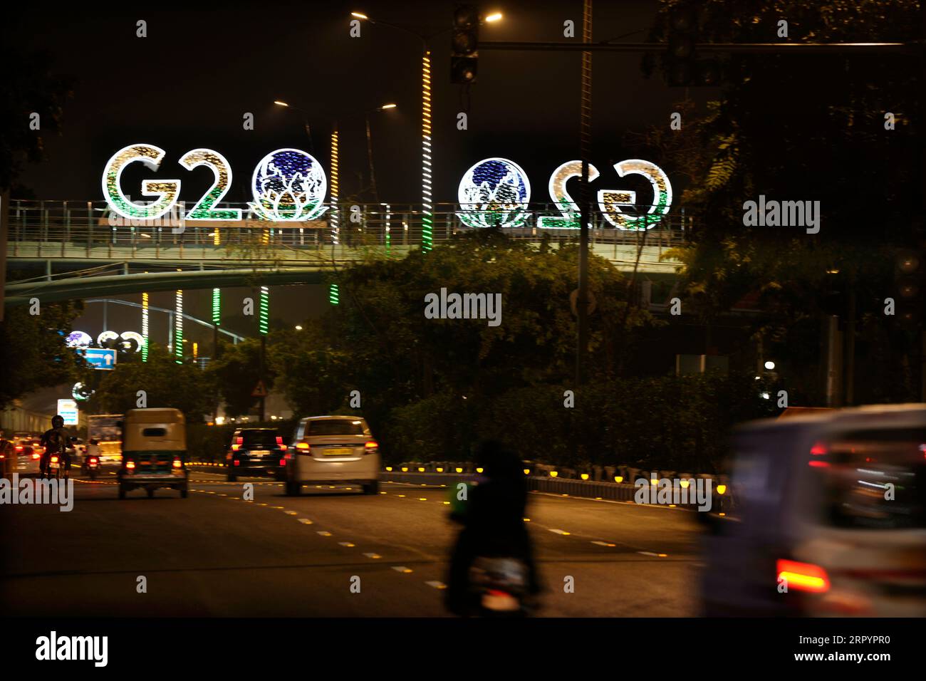 G20 logos are illuminated with the colors of the Indian flag on a ...