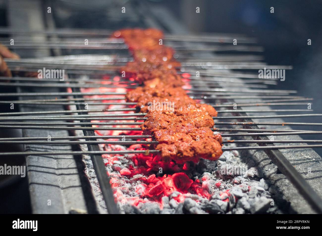 Smoky sheek kabab cooked on a coal fire, Famous street food sheek kabab ...