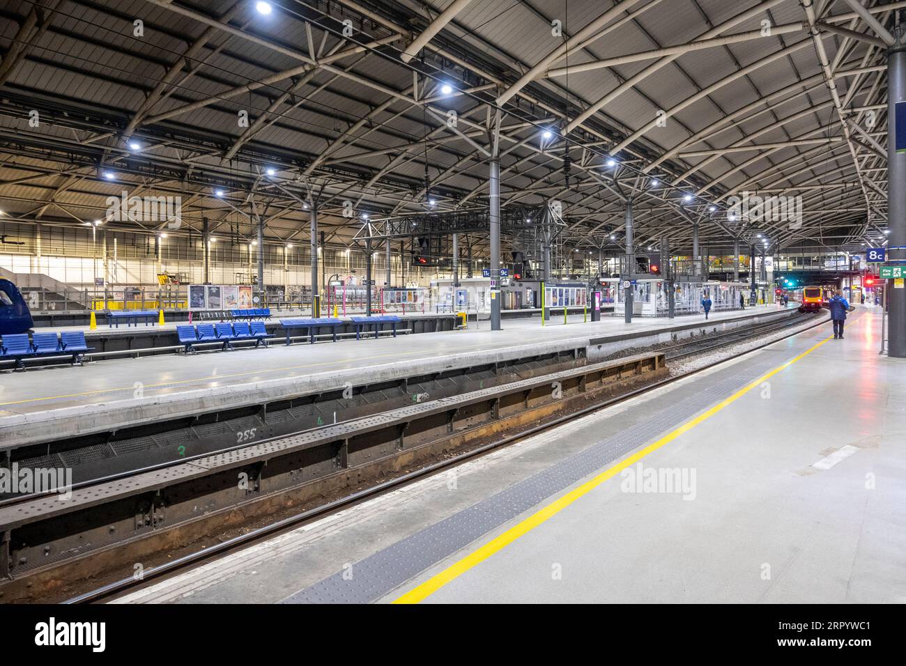 Modern train station at night Stock Photo - Alamy