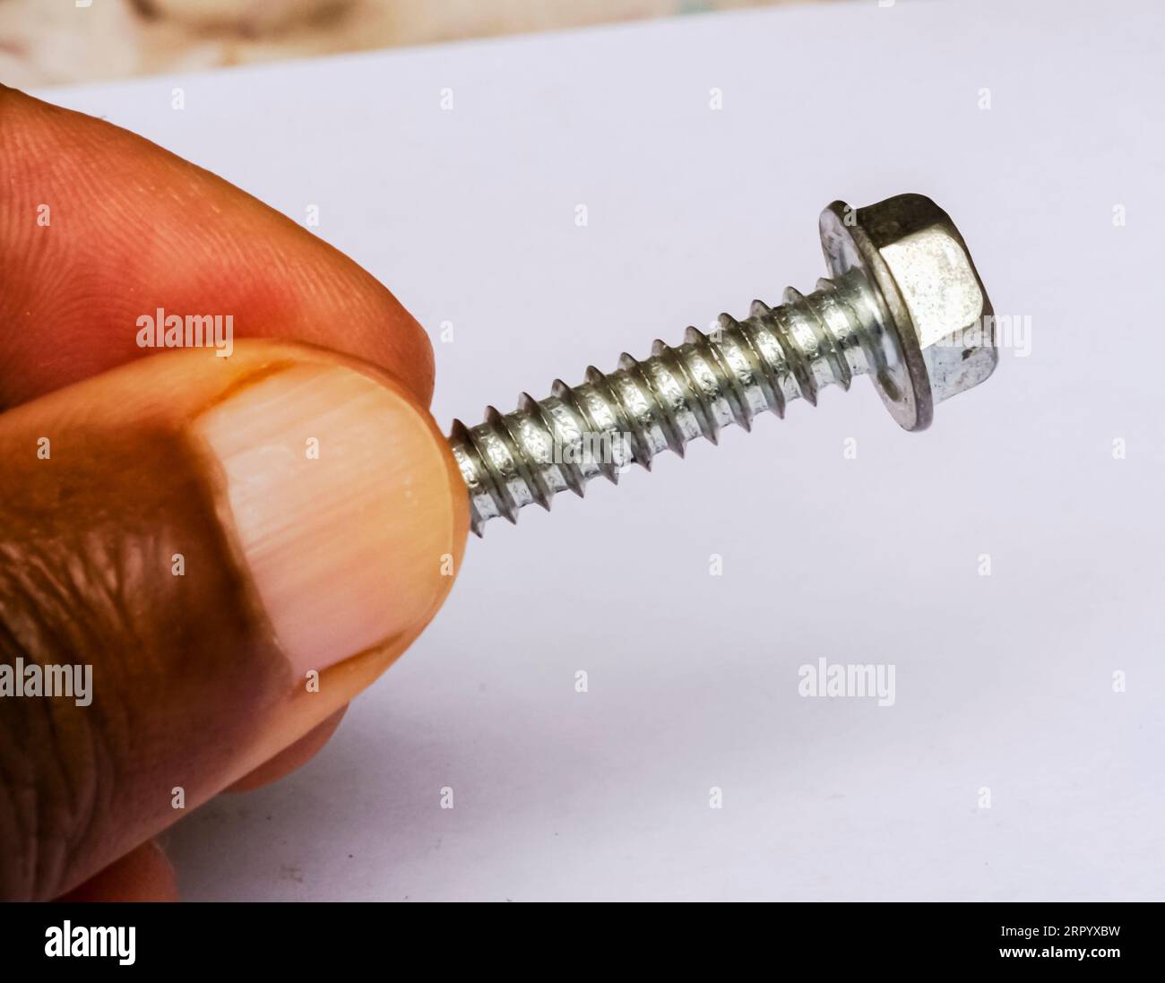 Holding A Screw Stock Photo - Alamy