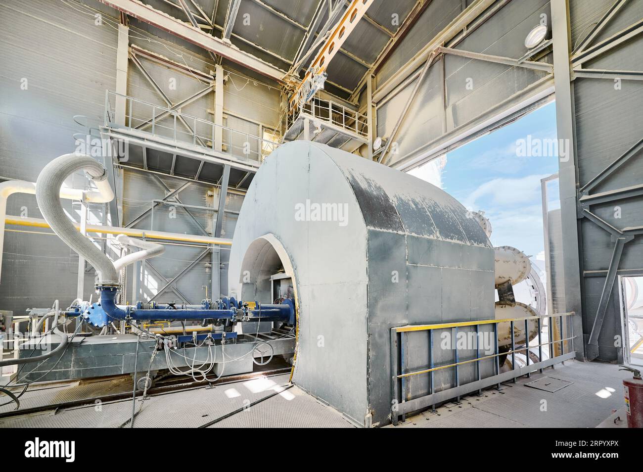 Fuel burning device of tubular rotary furnace at factory Stock Photo ...