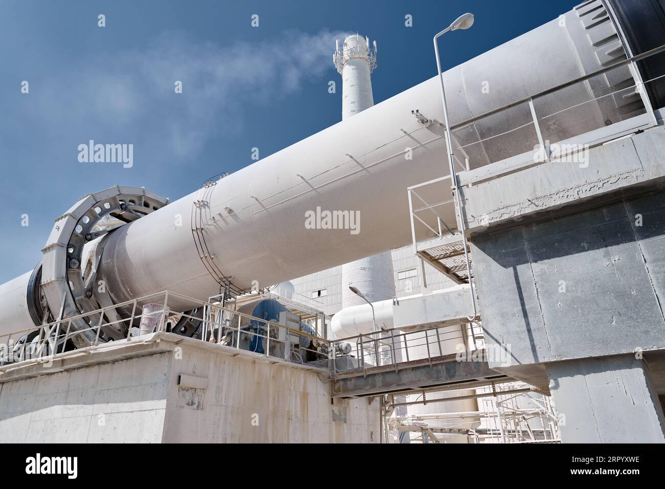 Limestone burning rotary furnace as pipe at industrial plant Stock ...