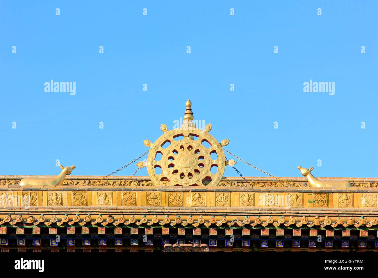 copper dharma wheel decorations on the wall in a temple, China Stock ...