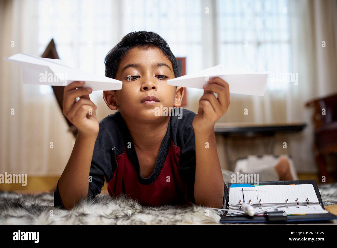 Students paper airplane classroom hi-res stock photography and images ...