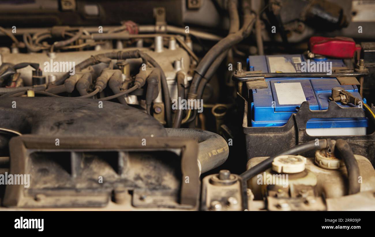 Battery in engine compartment of the car Stock Photo - Alamy