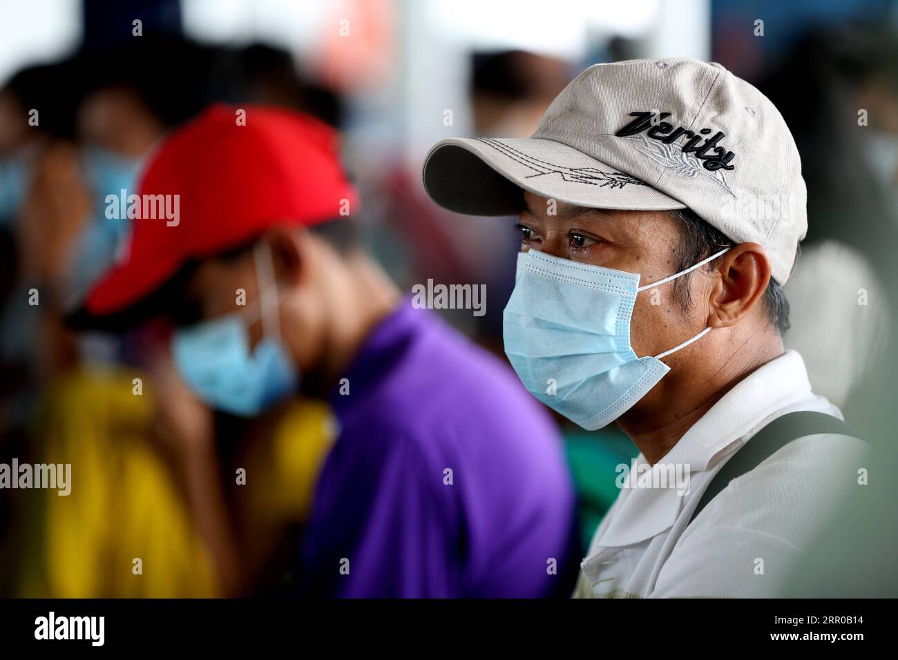 Two commuters wearing face hi-res stock photography and images - Alamy