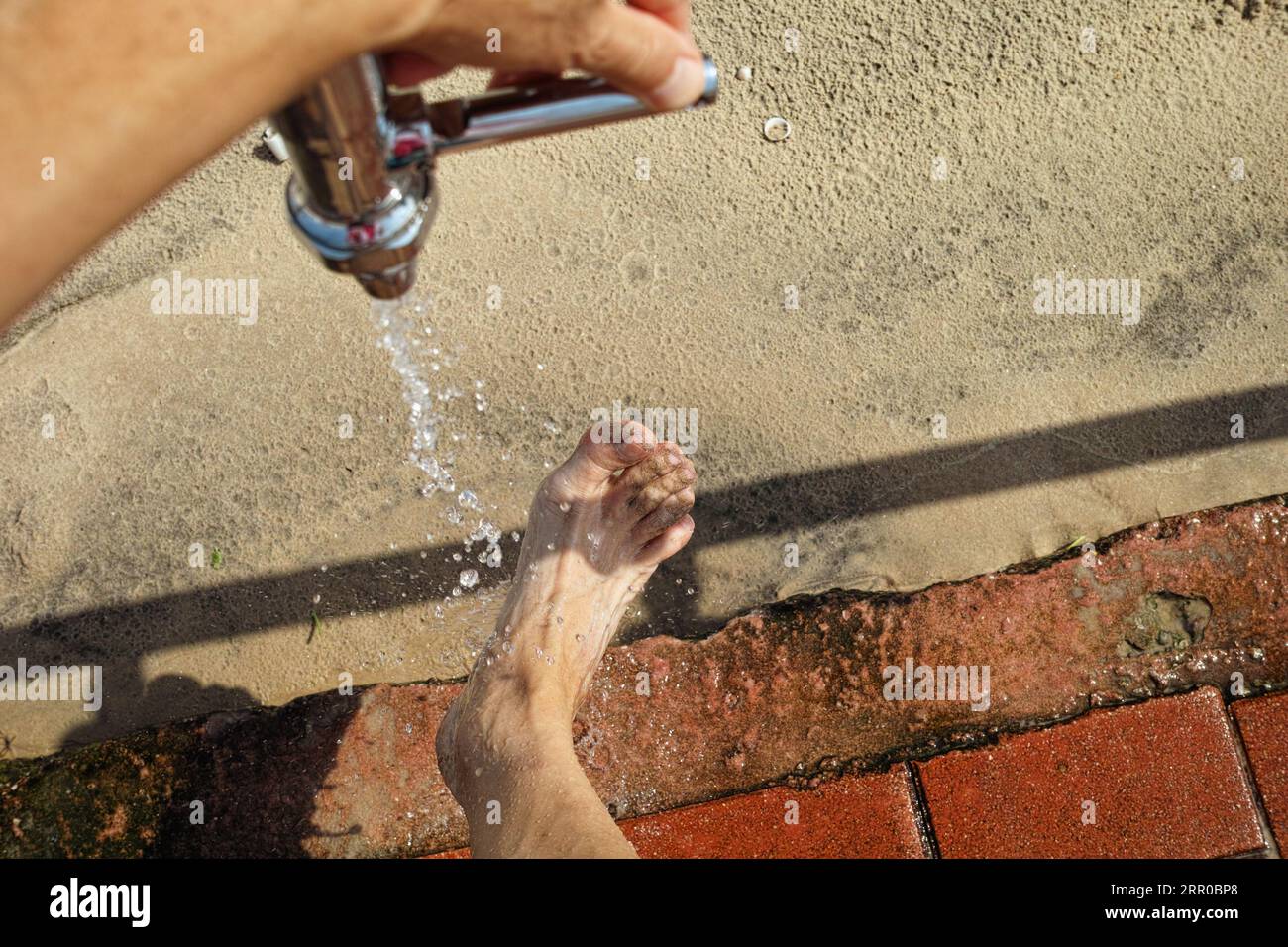 Beach foot shower hi-res stock photography and images - Alamy