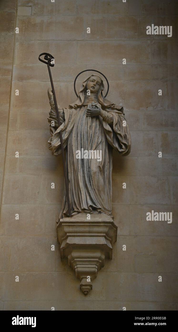 Limestone sculpted religious statue on the exterior of the Baroque ...