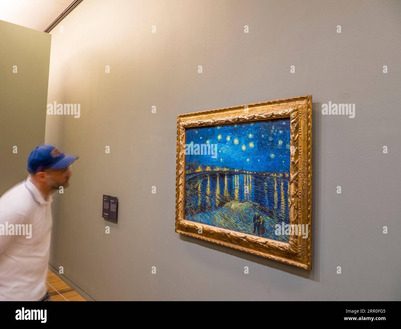 People Looking at Vincent Van Gogh, Starry Night Over the Rhône, Musée ...