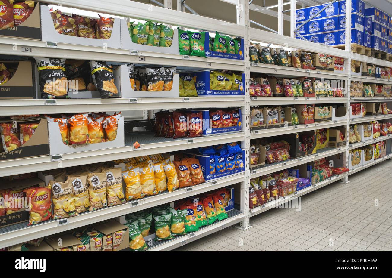 Shelves with crisps in a supermarket Centre Commerçiale Europecoquelle ...
