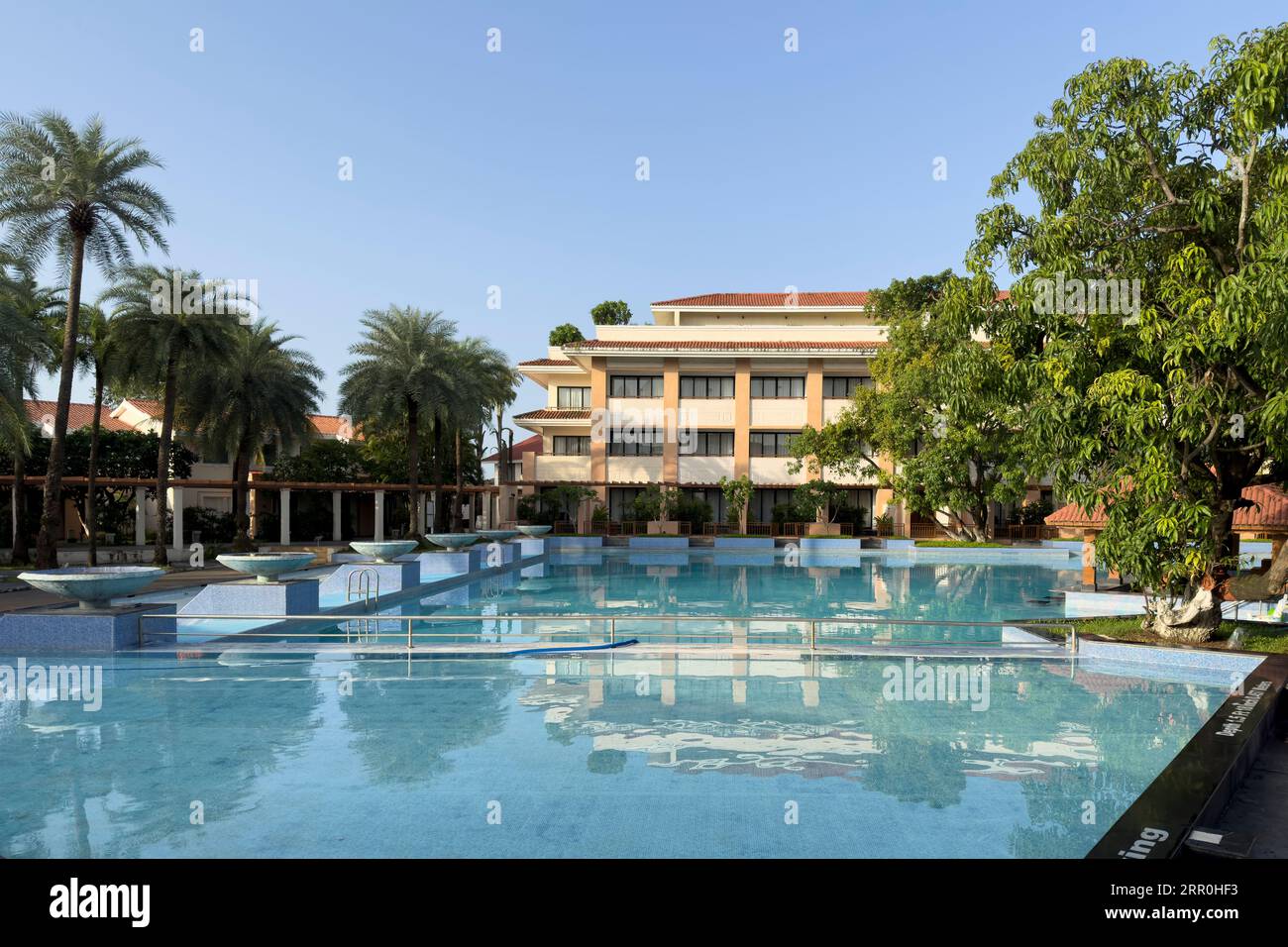 The swimming pool at Radisson Hotel located in Alibaug a beachside town ...