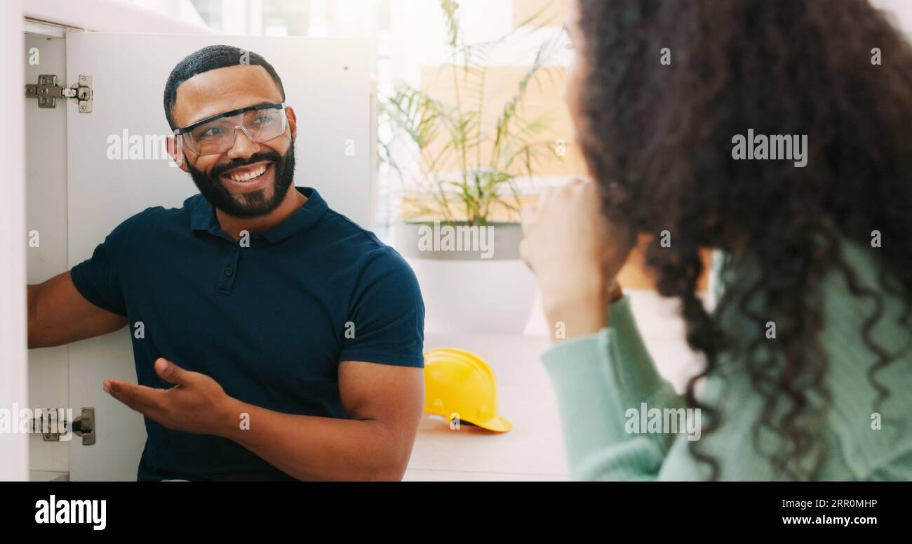 Plumbing, handyman and maintenance with man smiling and sink with ...