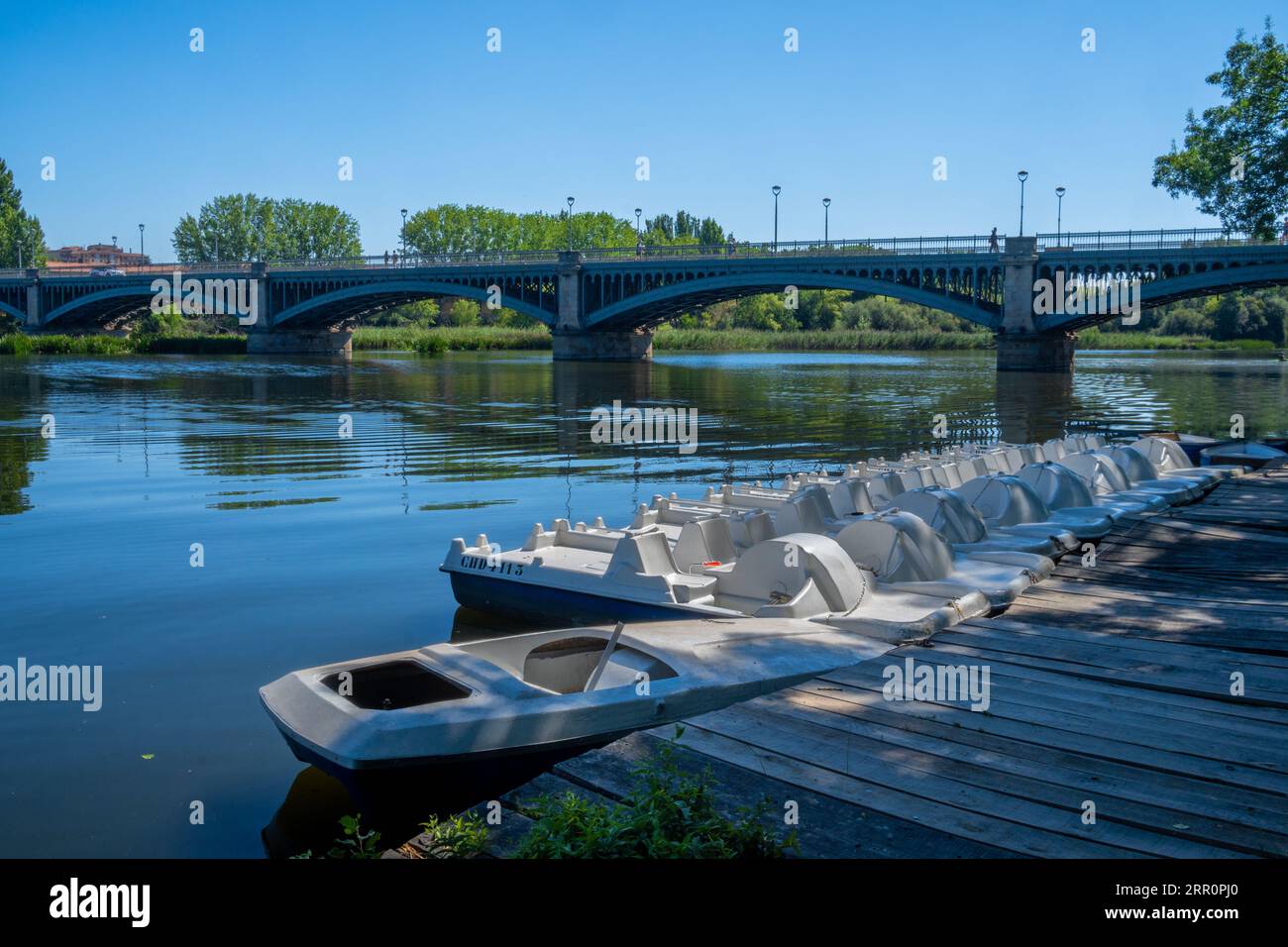 Pleasure boats and pedal skates docked at the dock and basin of the ...