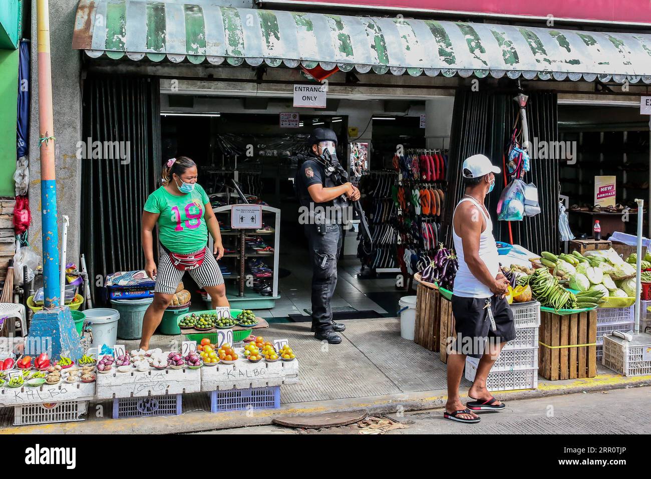200826 -- MANILA, Aug. 26, 2020 -- A member of the Special Weapons and ...