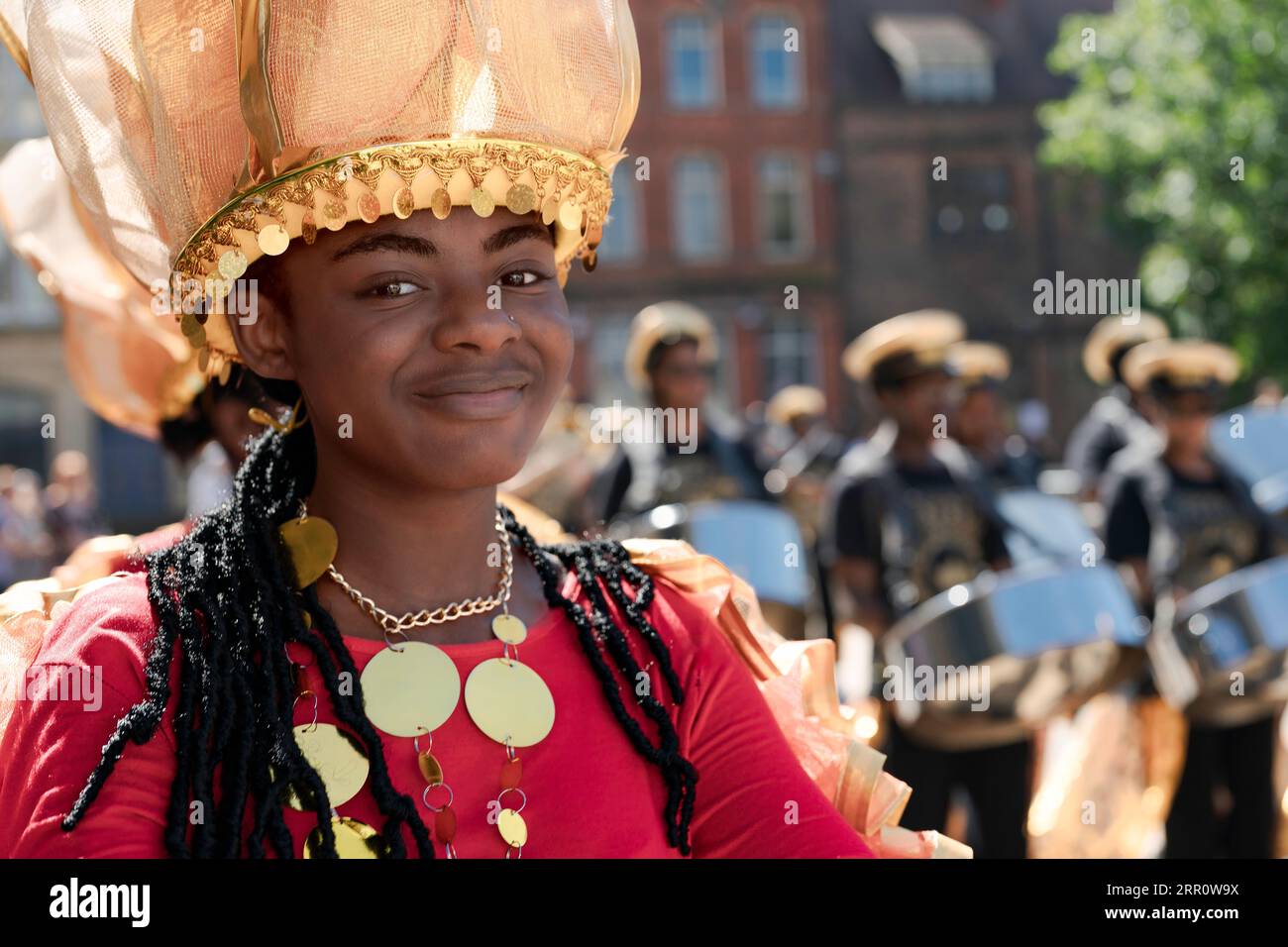 Dancer of Steel pan orchestra playing along streets of central Hull ...