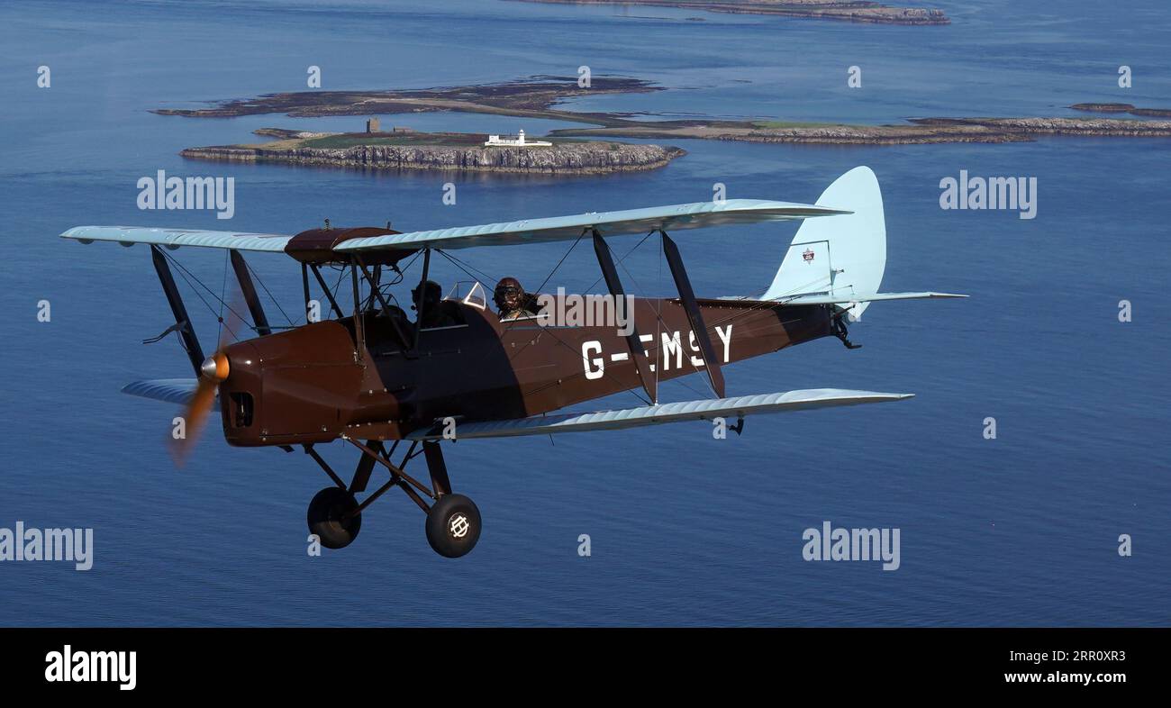 The World War II vintage Tiger Moth plane takes to the sky over the ...