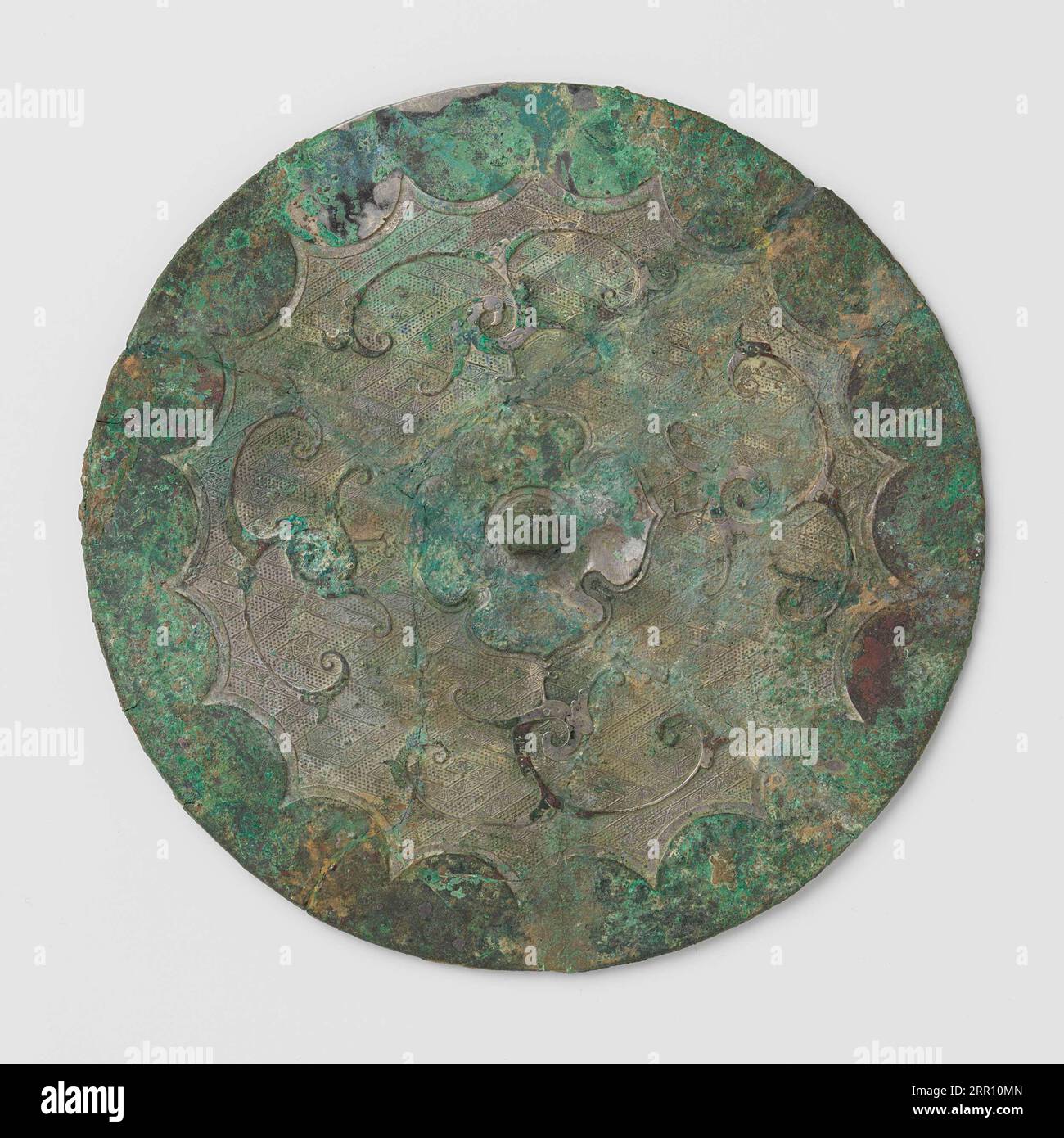 Bronze mirror with scalloped edge, four birds and arabesques, Warring ...