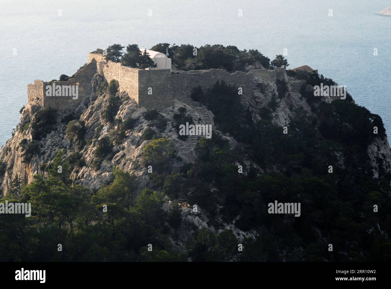 Greece, Rhodes island Monolithos village and Monolithos castle Stock ...