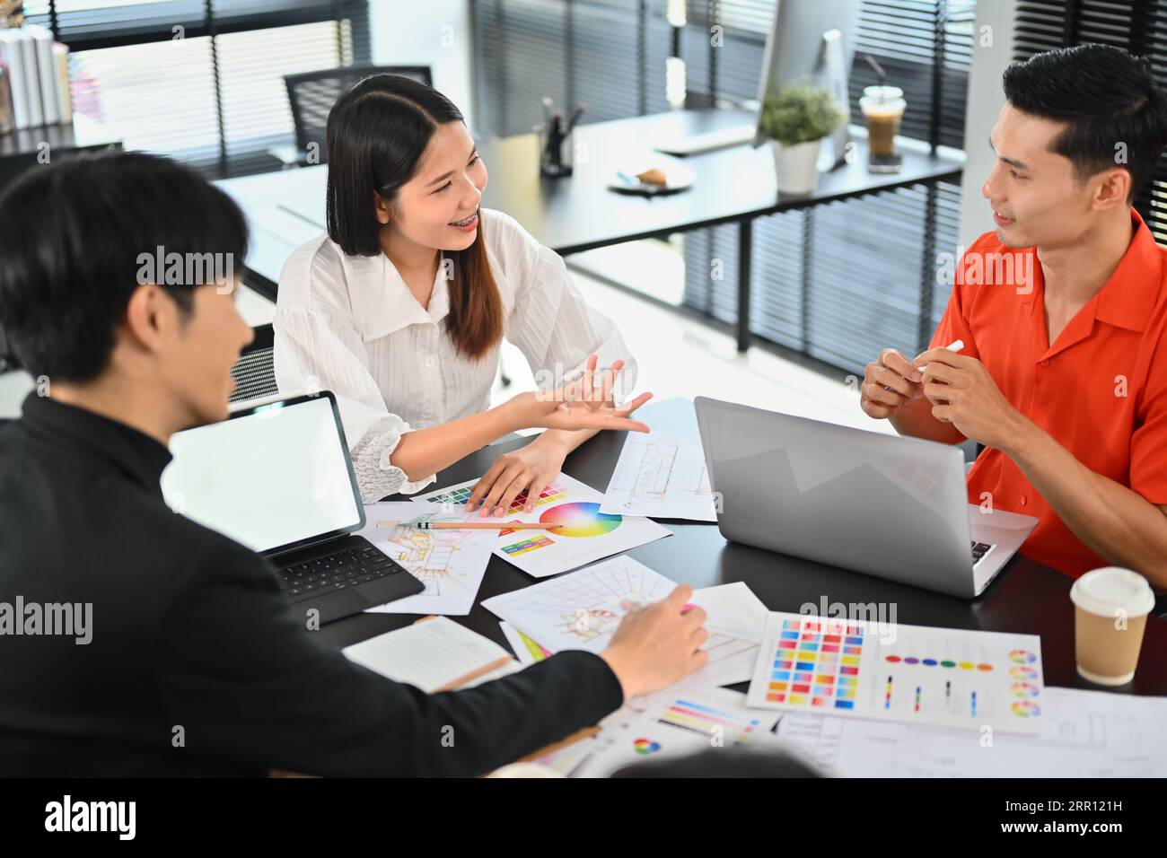 Male and female creative designer brainstorming for new interior design ... Male and female creative designer brainstorming for new interior design ...