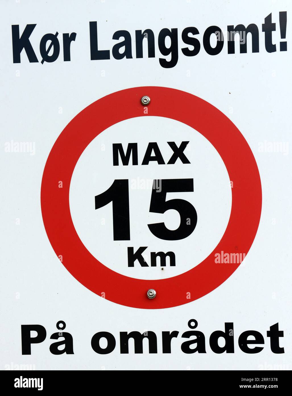 A Danish village speed limit sign Stock Photo - Alamy