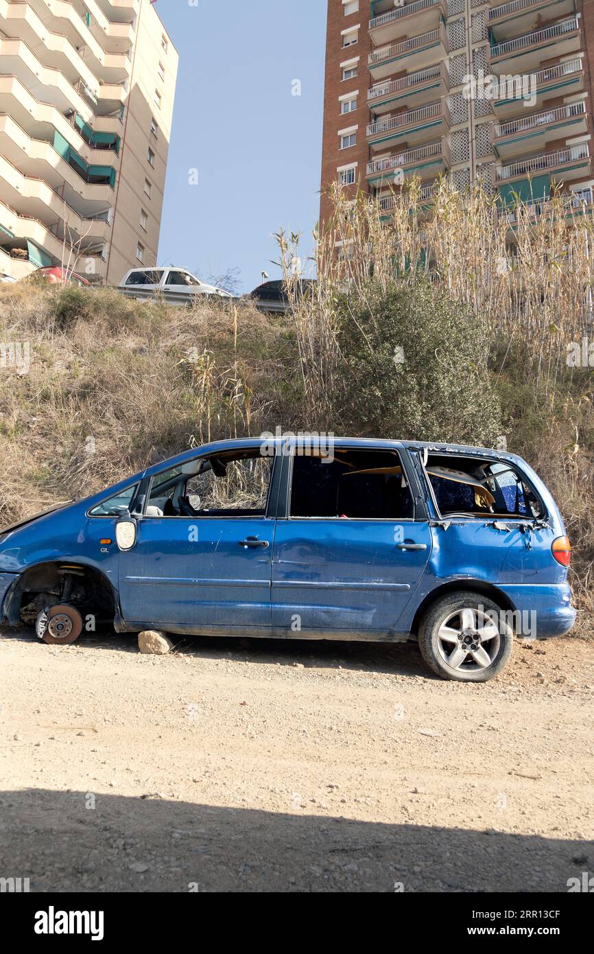 Barcelona, Spain - February 19, 2023:A deserted and damaged minivan ...