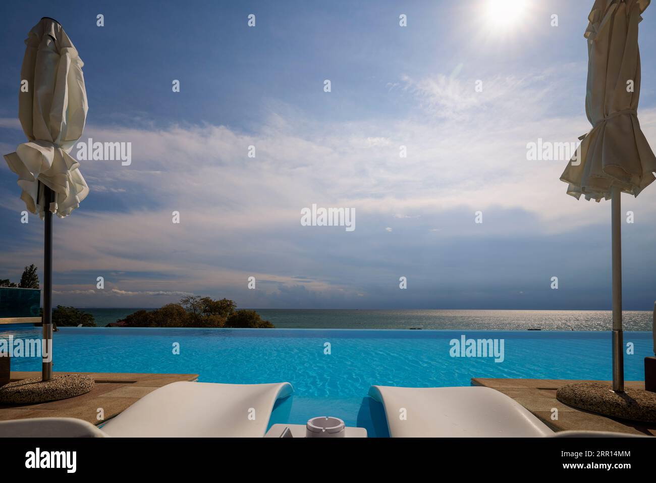 Beautiful landscape with an infinity pool by the sea Stock Photo - Alamy
