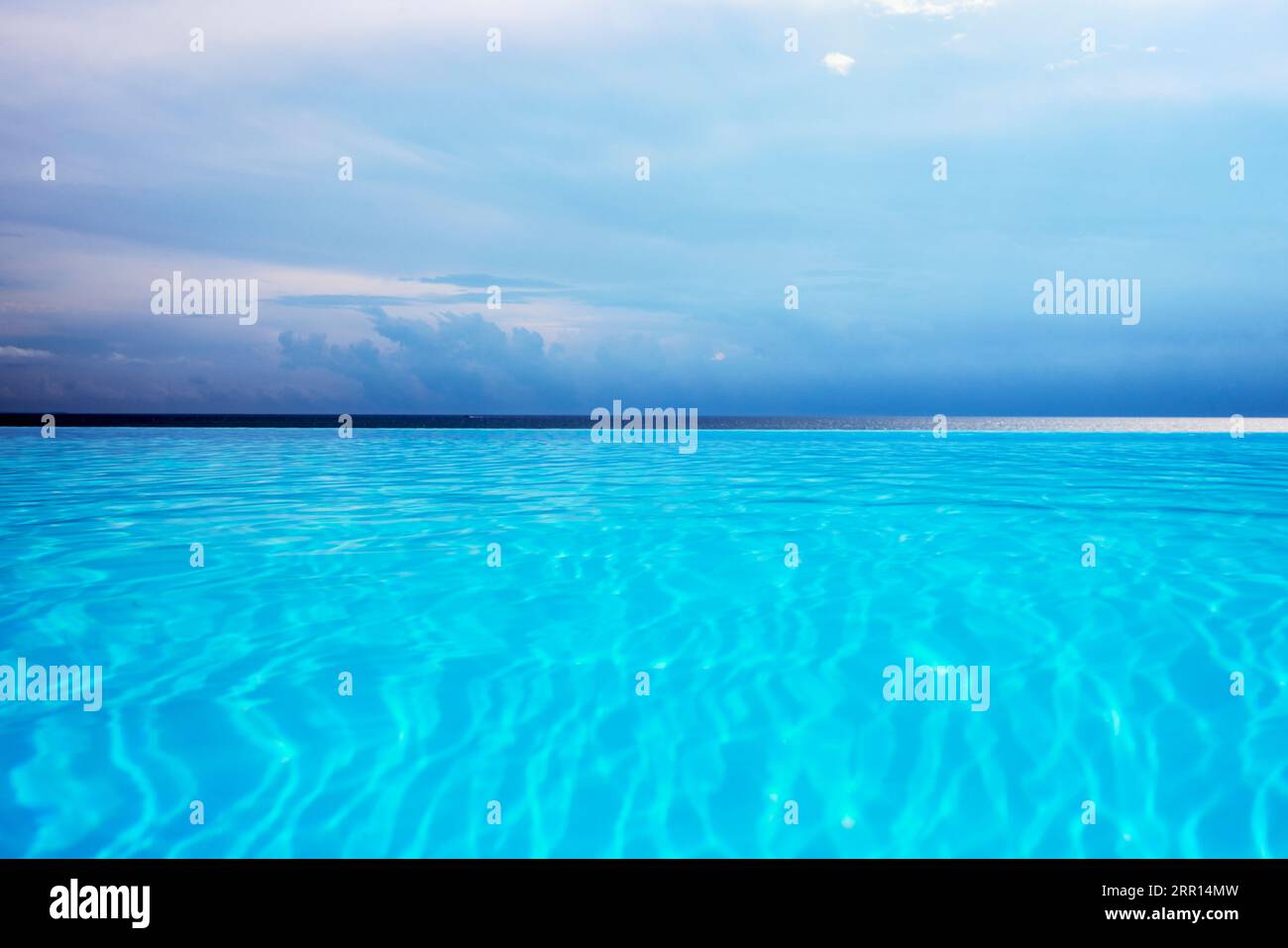 Beautiful landscape with an infinity pool by the sea Stock Photo - Alamy