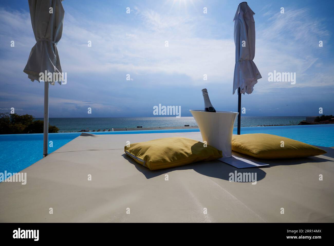 Beautiful landscape with an infinity pool by the sea Stock Photo - Alamy