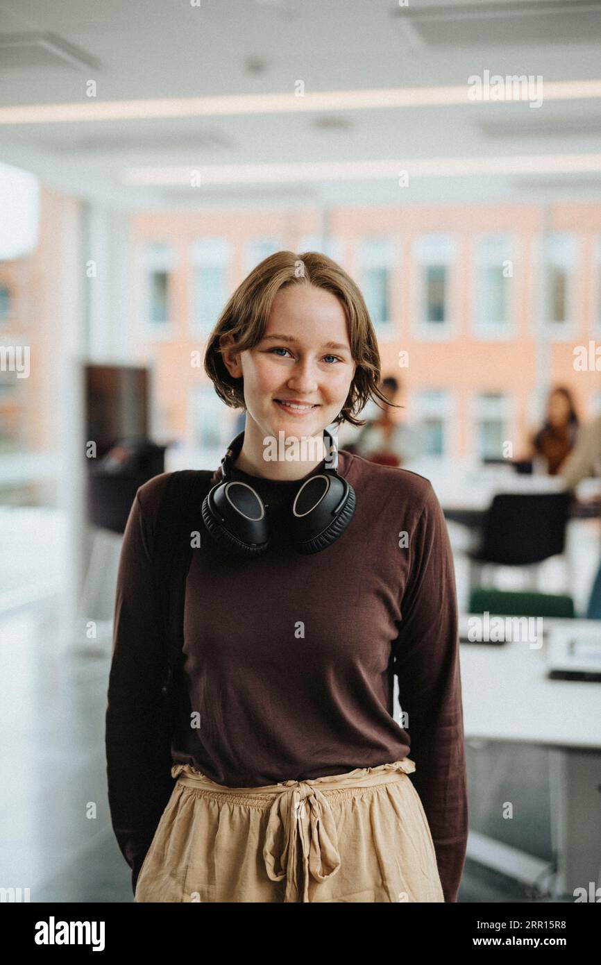 Female student standing hi-res stock photography and images - Alamy
