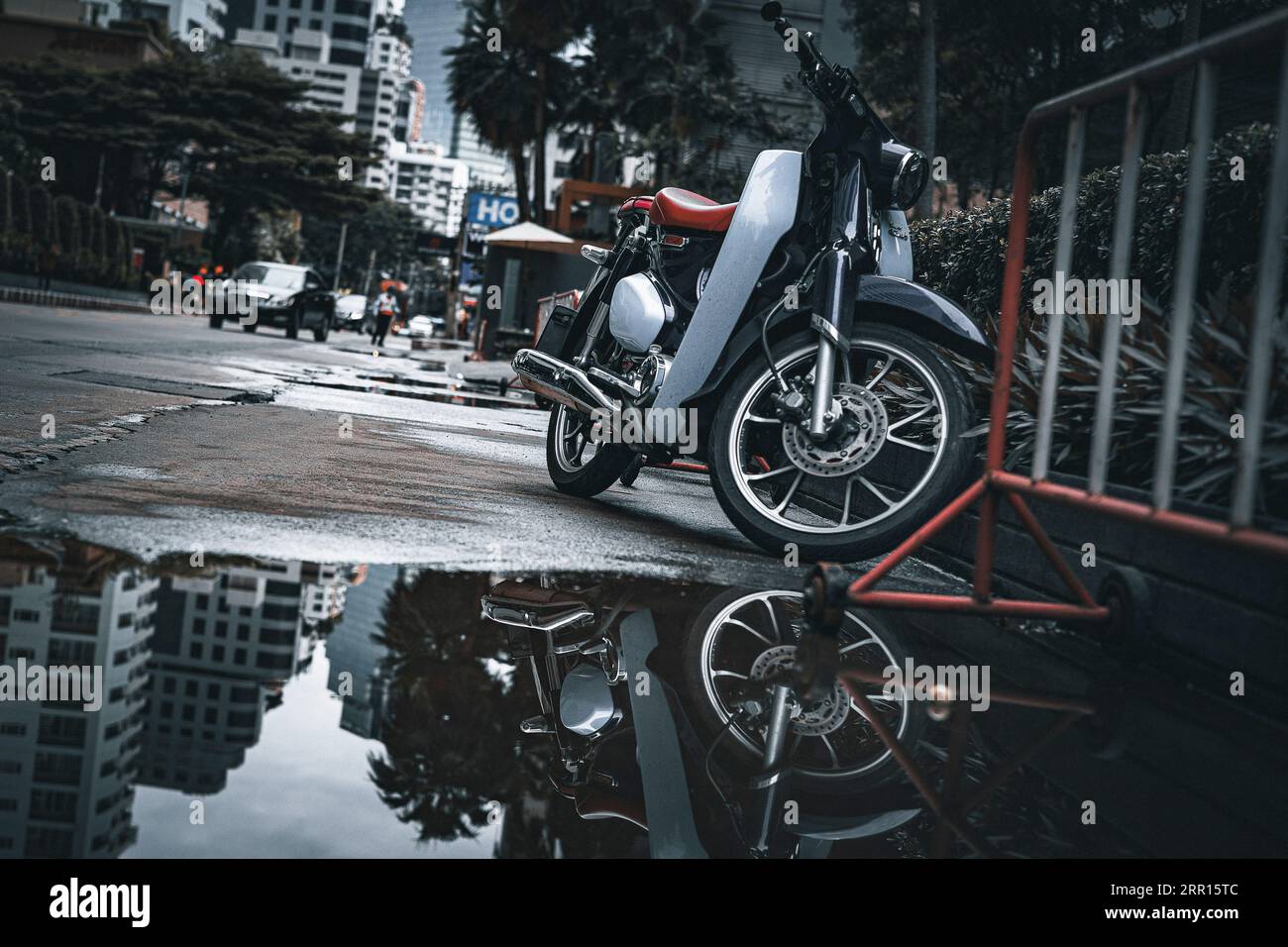 A motorcycle reflected in a puddle Stock Photo - Alamy