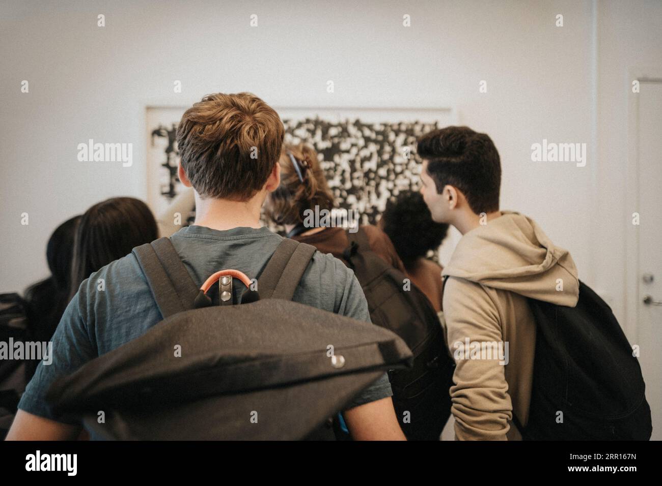 Student checking bulletin board hi-res stock photography and images - Alamy
