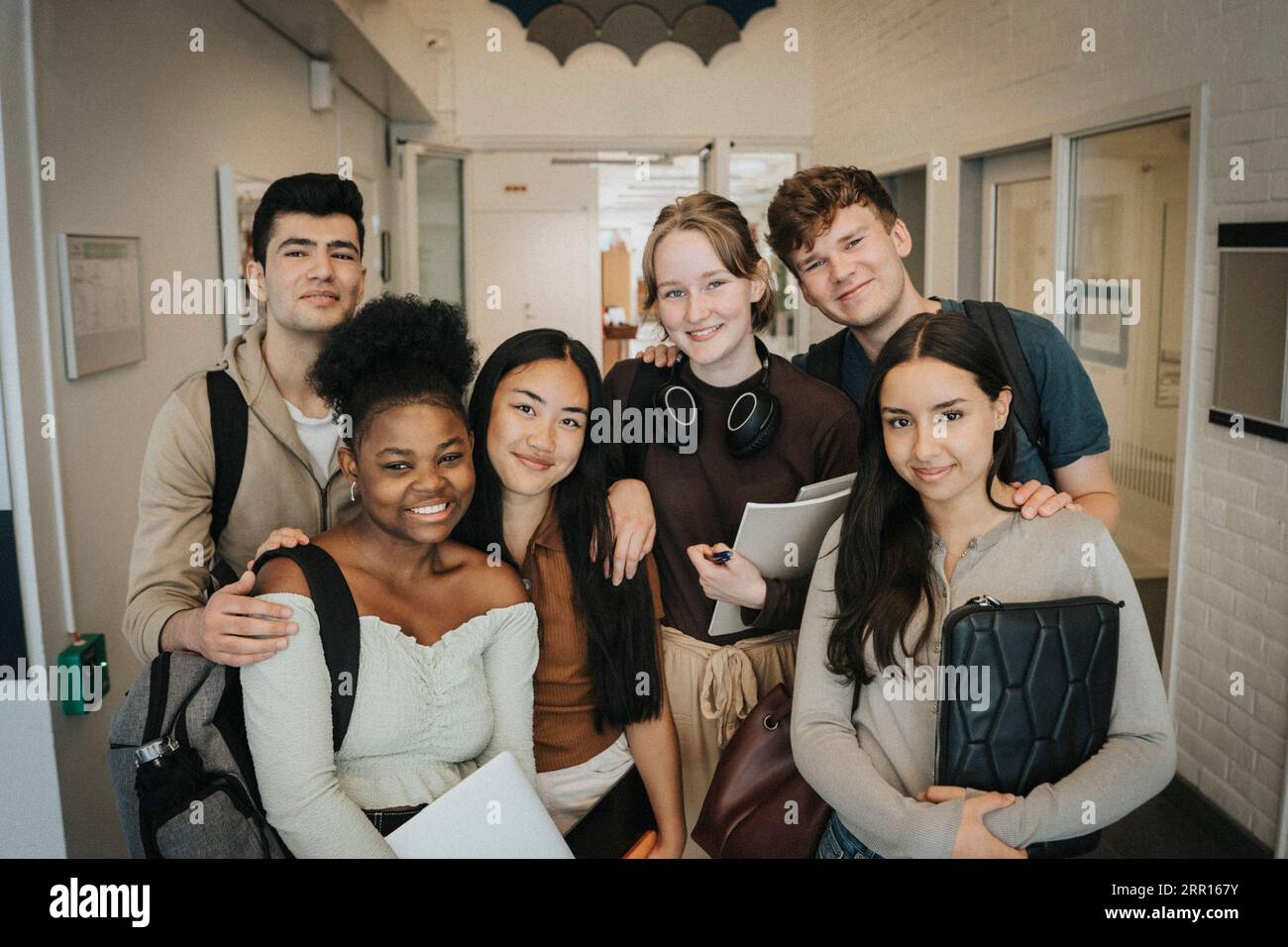 Portrait of happy multiracial students at university Stock Photo - Alamy