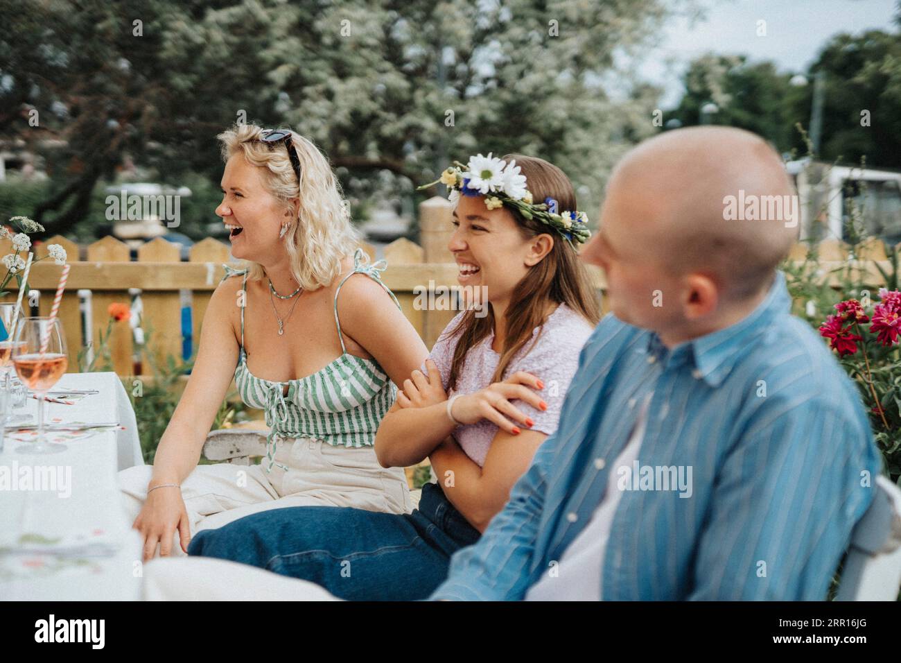 Group laughing female friends having hi-res stock photography and ...