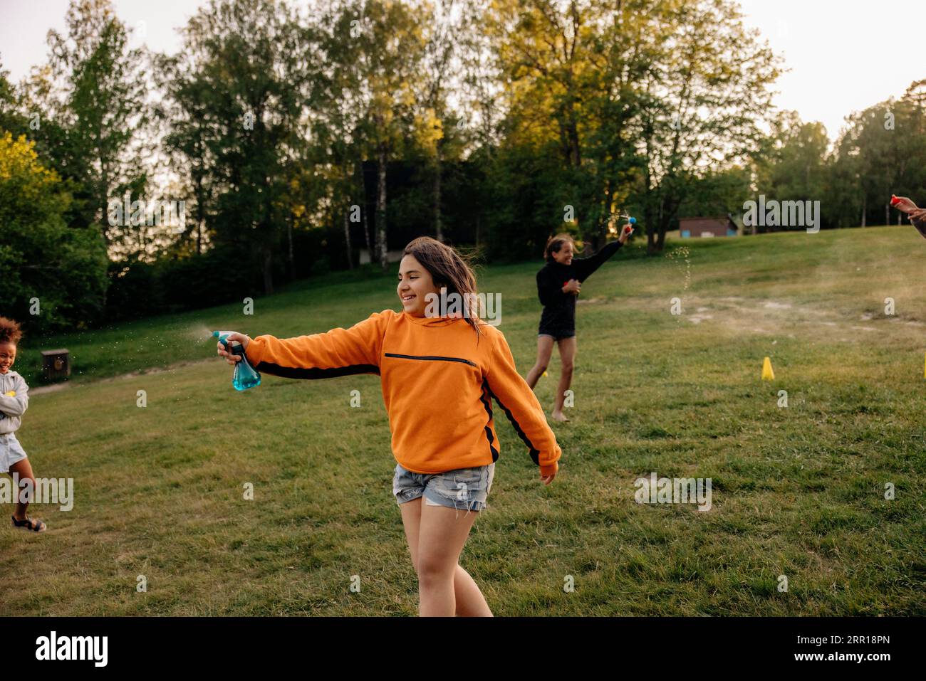 Girls spraying hi-res stock photography and images - Alamy
