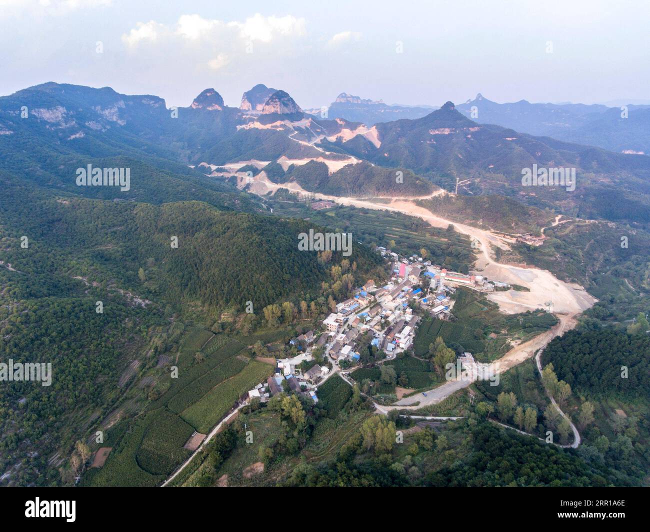 Teacher looking over a kids shoulder hi-res stock photography and ...