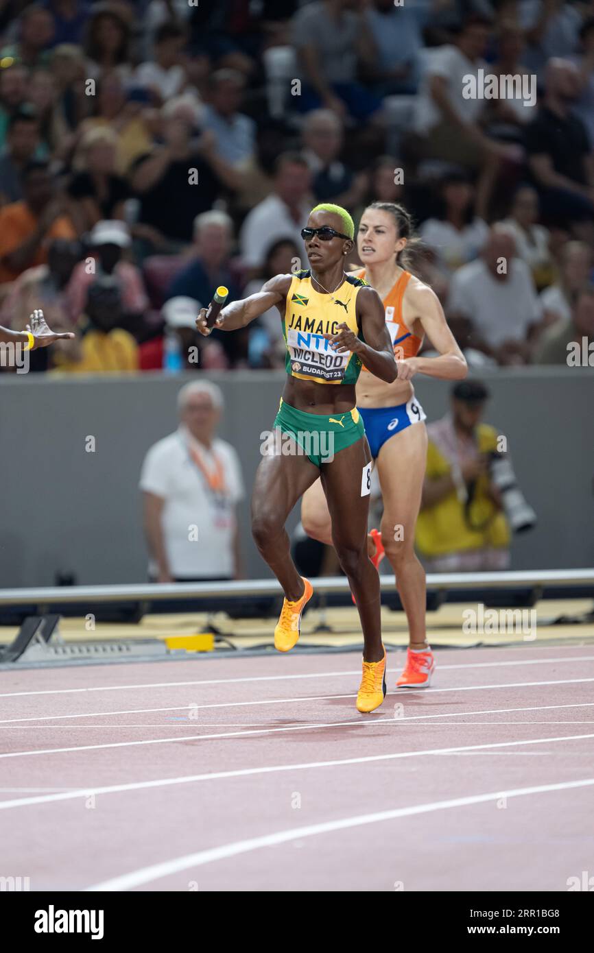 Candice McLeod participating in the 400 meters relay at the World ...