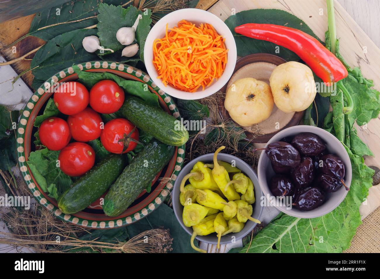 Fermented organic food in bowls. Set of fermented products. Variety ...