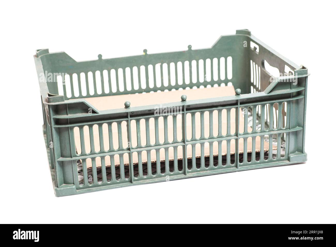 Empty vegetable crate, isolated on white Stock Photo - Alamy