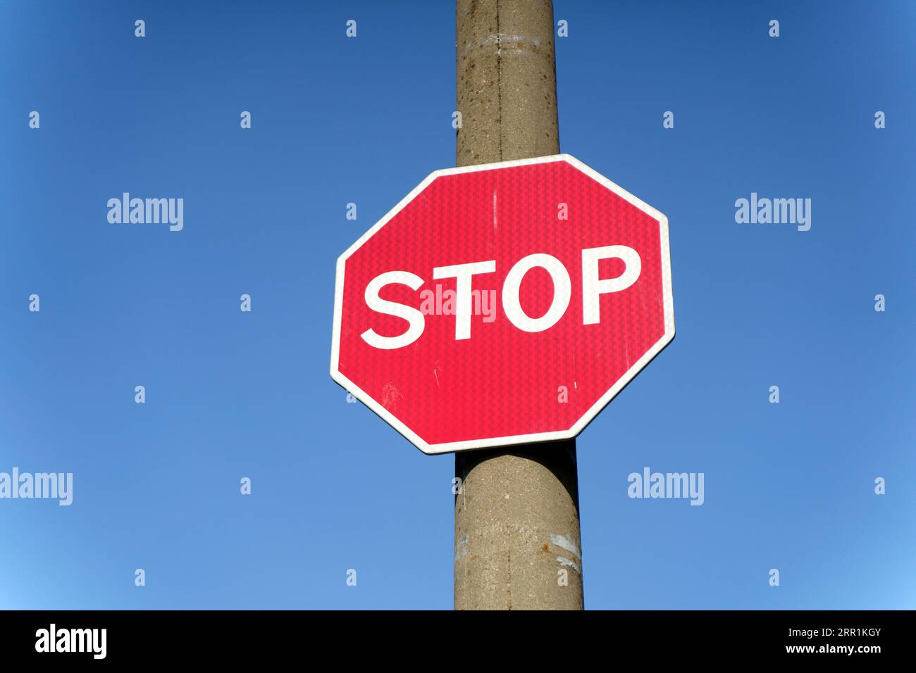 Stop sign on blue sky background. Stop and end road on the street ...
