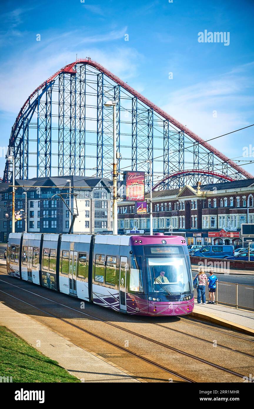 Early morning tram passing the Big One roller coast at Blackpool ...