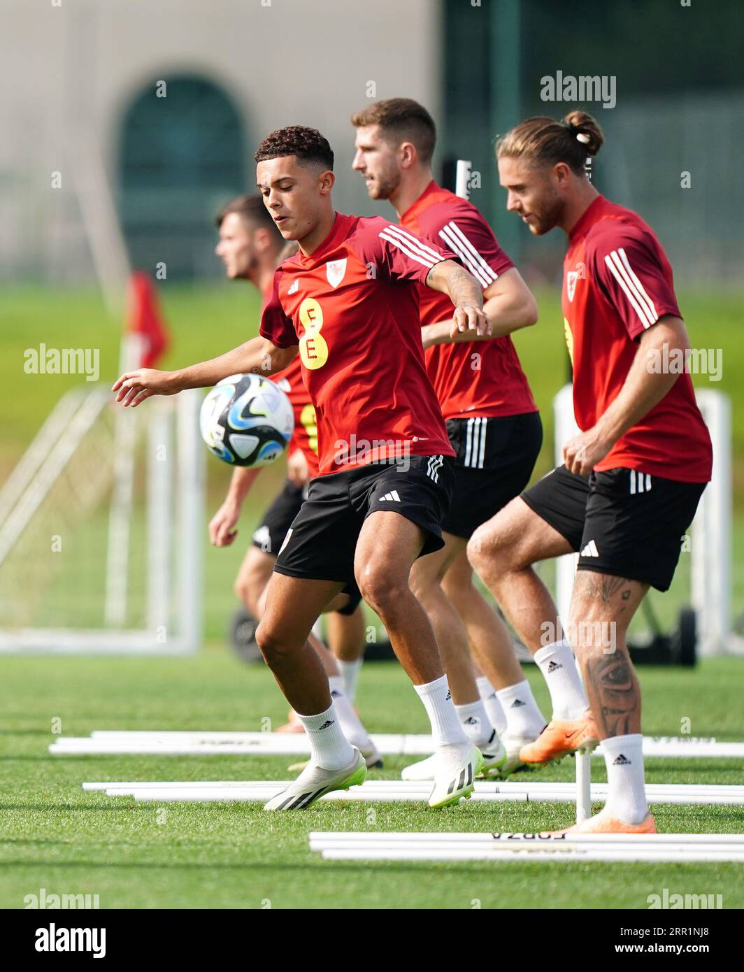 Wales' Brennan Johnson (left) during a training session at the Vale ...