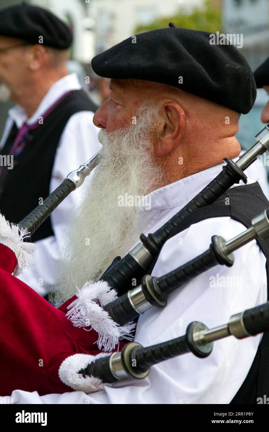 Breton dancers in traditional costume and headdresse..Fete des fraises ...