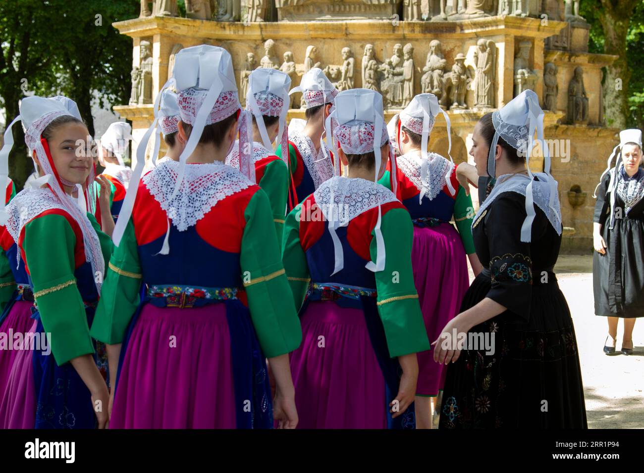 Breton dancers in traditional costume and headdress..Fete des fraises ...