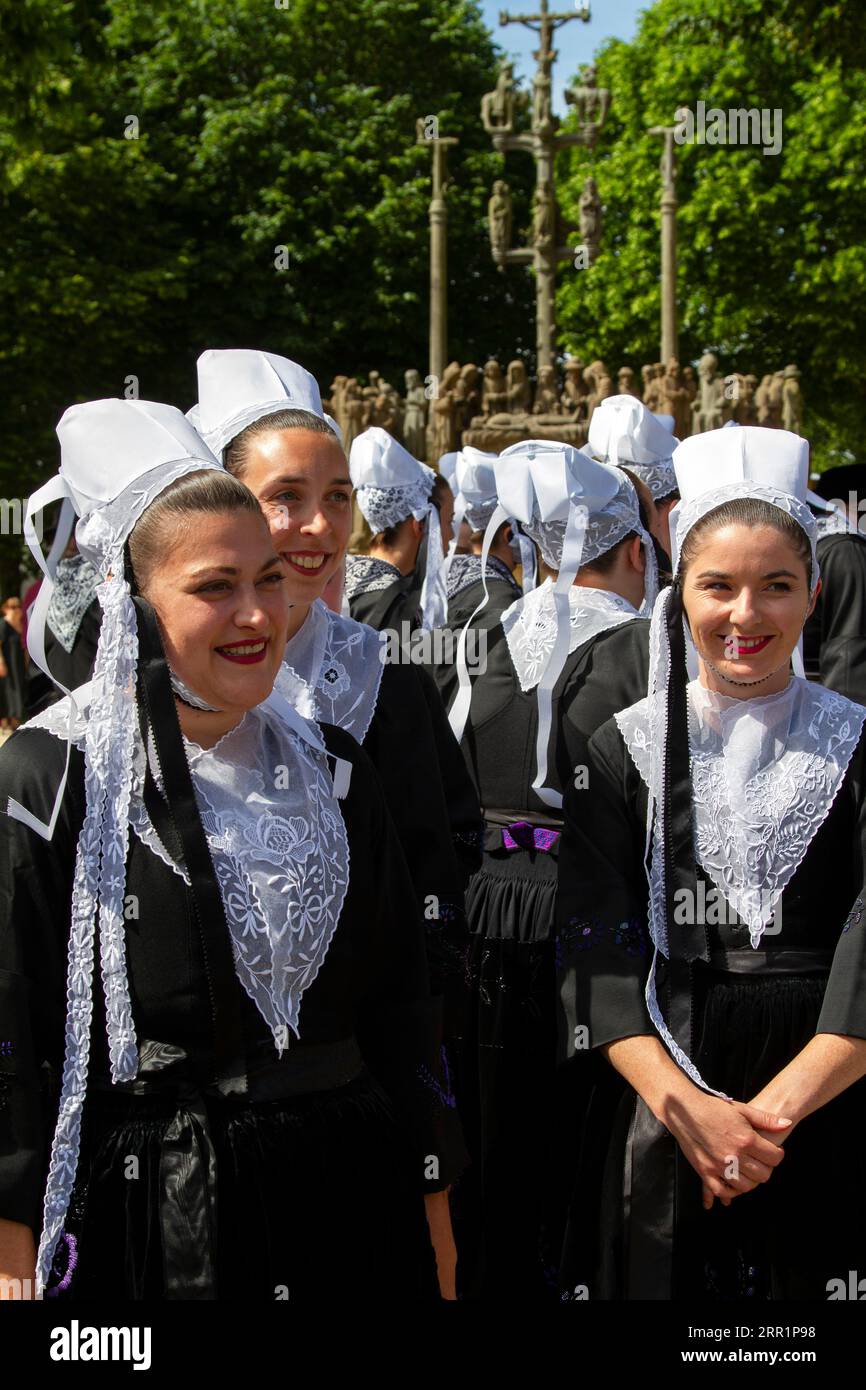 Breton dancers in traditional costume and headdress..Fete des fraises ...