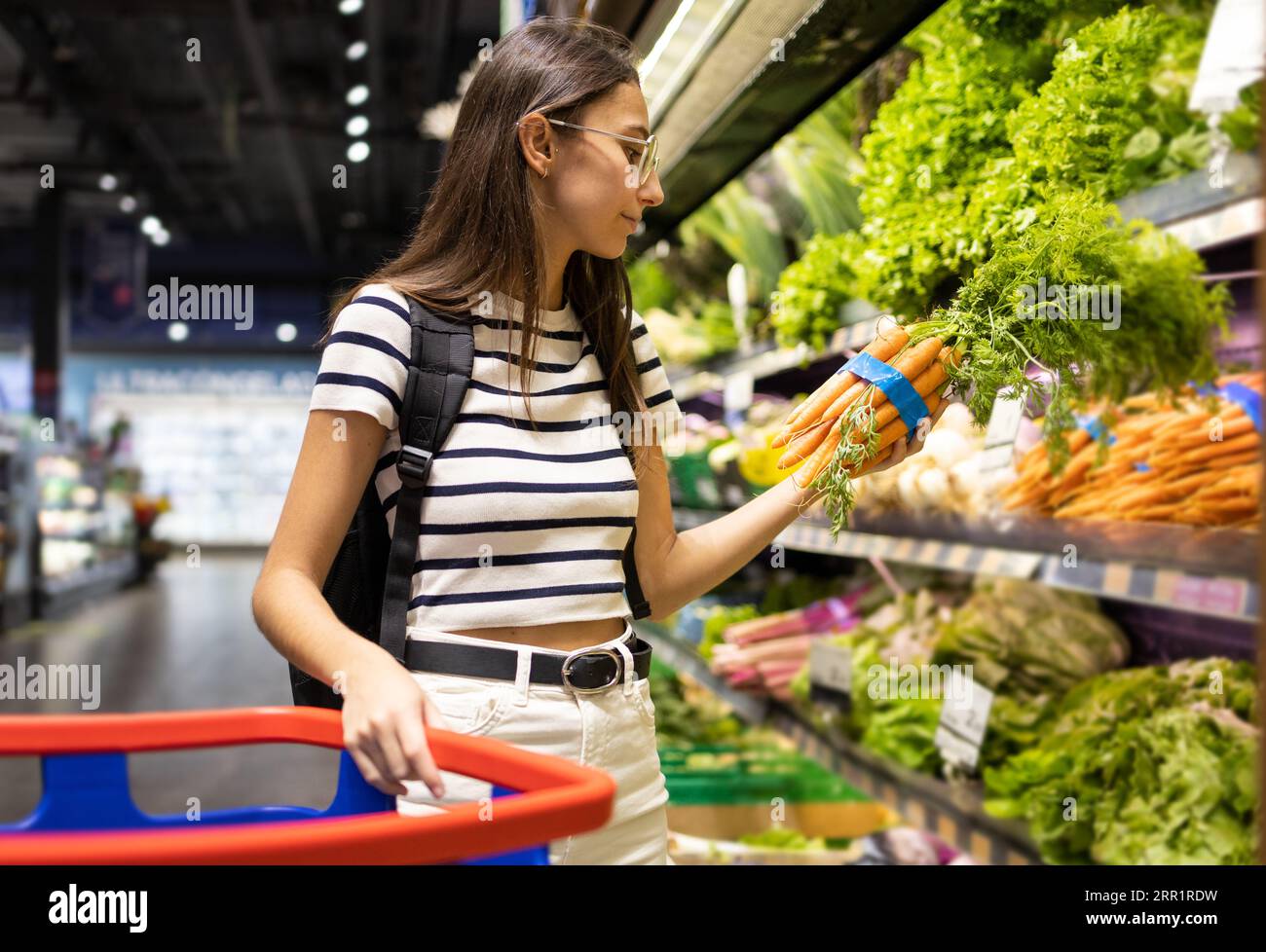 Serious supermarket hypermarket female hi-res stock photography and ...