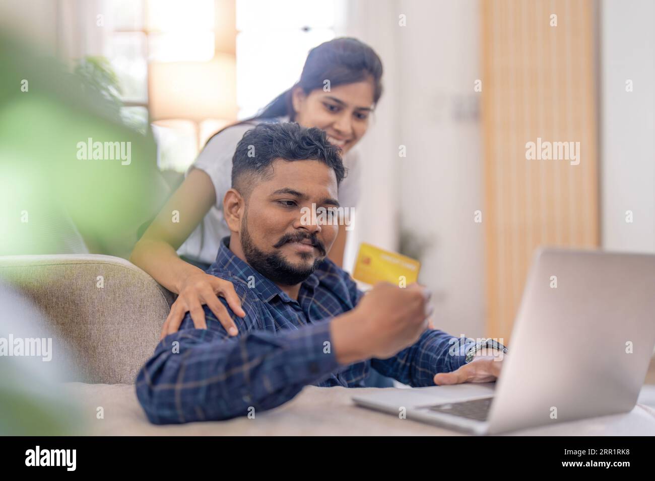 Indian couple making purchase hi-res stock photography and images - Alamy
