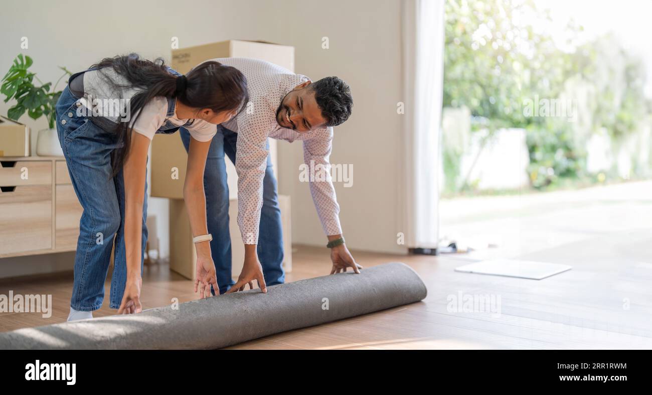 Couple Indian moving into a new house, Relocation, moving to new home ...