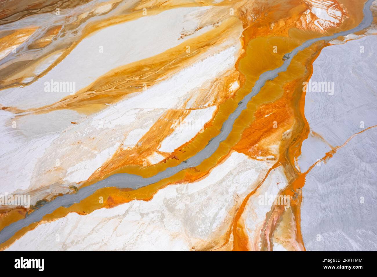 Abstract full frame background of yellow colored surface of mineral ...