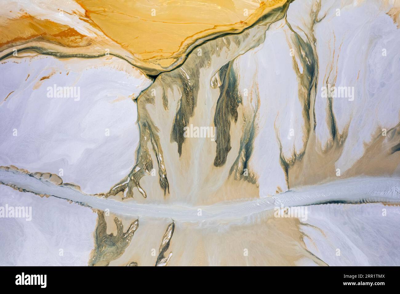 Abstract full frame background of yellow colored surface of mineral ...